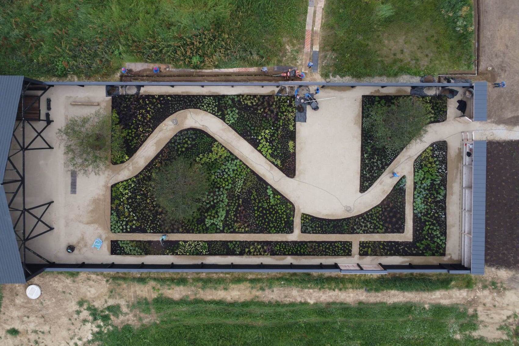 Practice Landscape Converts a Barn Into a Walled Garden in the Midwest